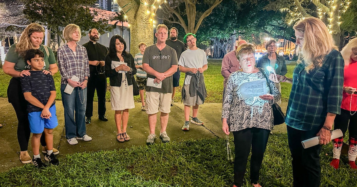 Parishioners Pray at a Local Park to Highlight the Reason for the ...